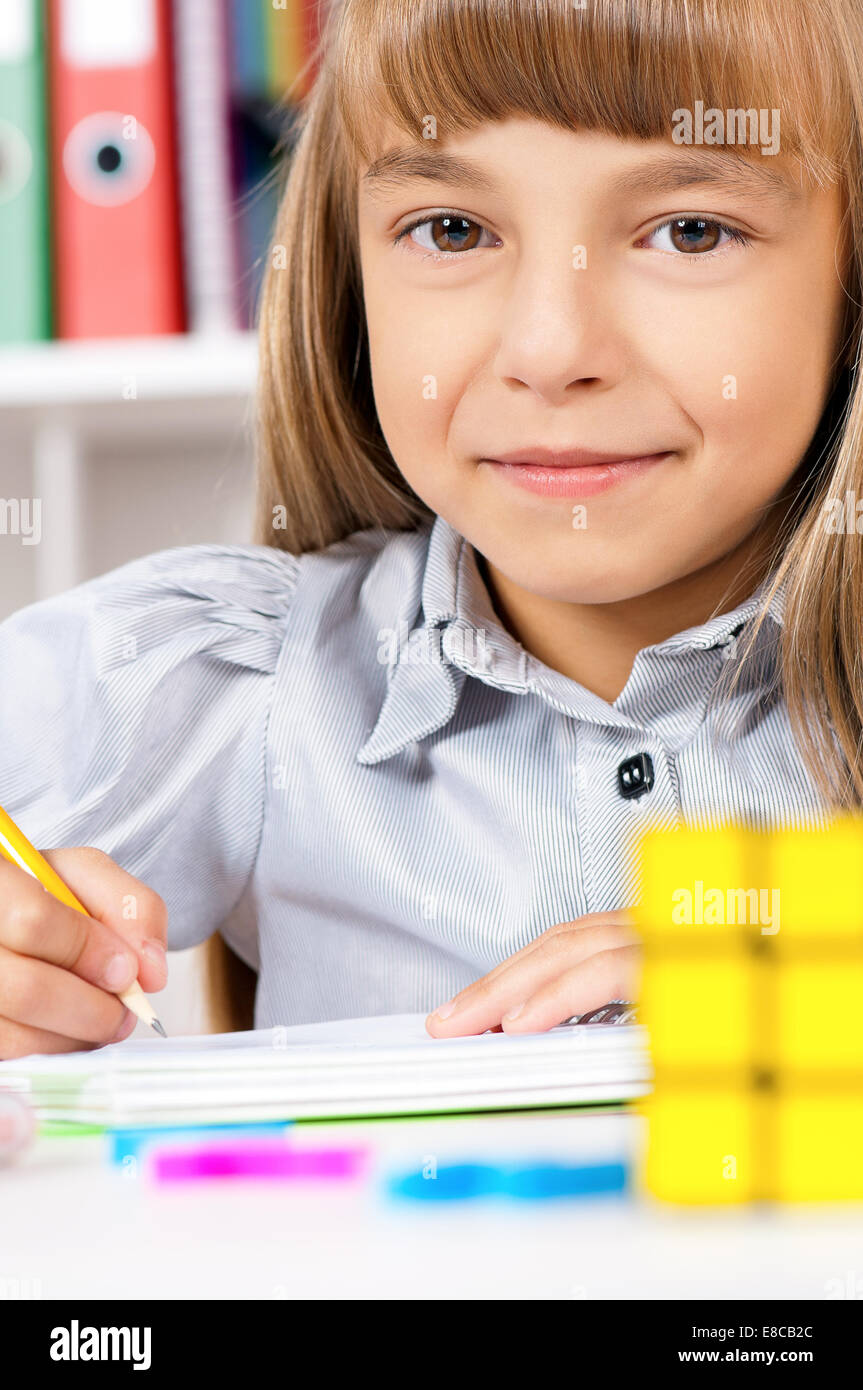 Girl doing homework Stock Photo - Alamy