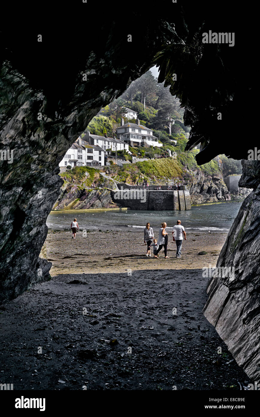 Cave entrance at the popular tourist destination of Polperro Cornwall ...