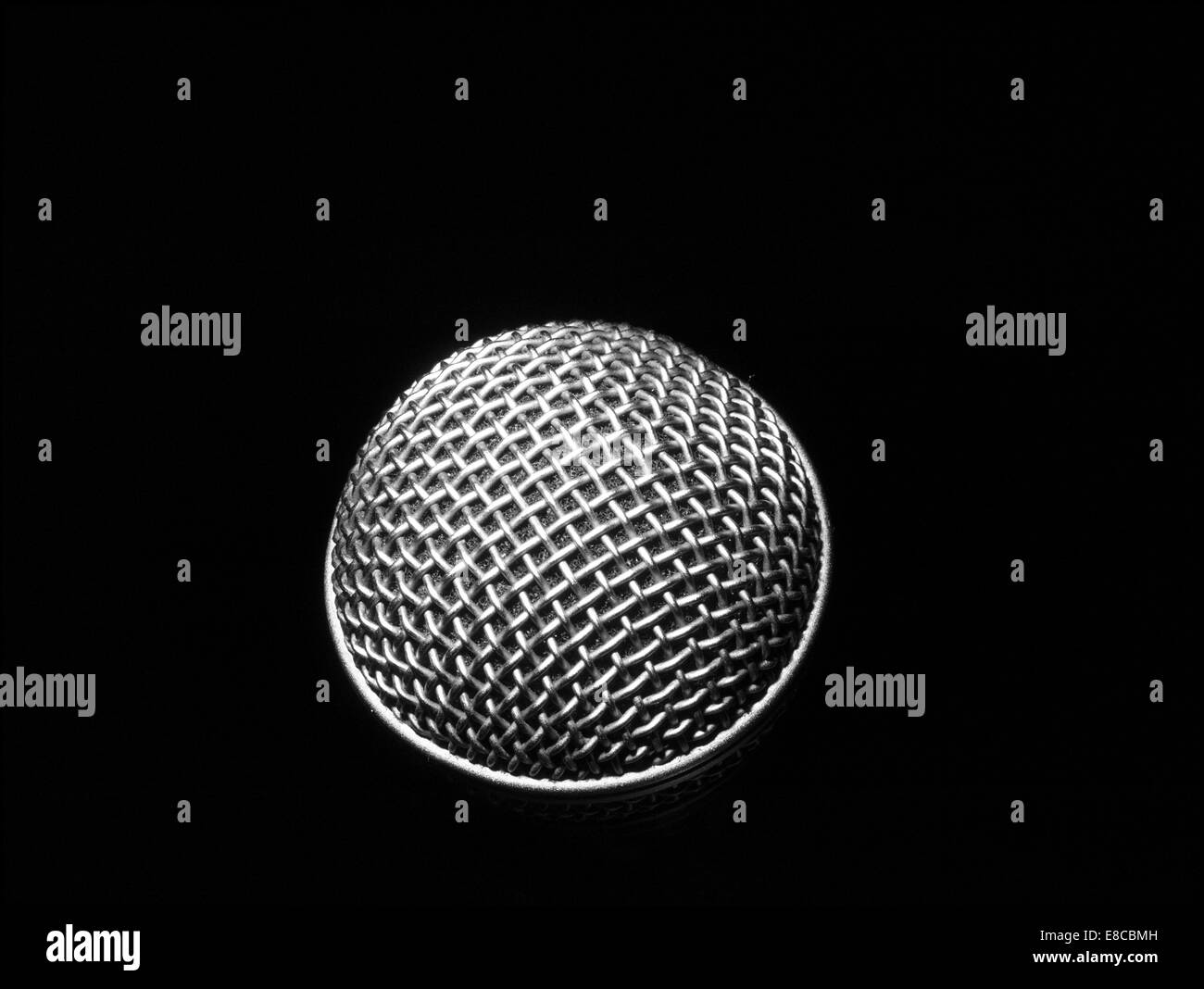 Silver microphone on a black background Stock Photo - Alamy
