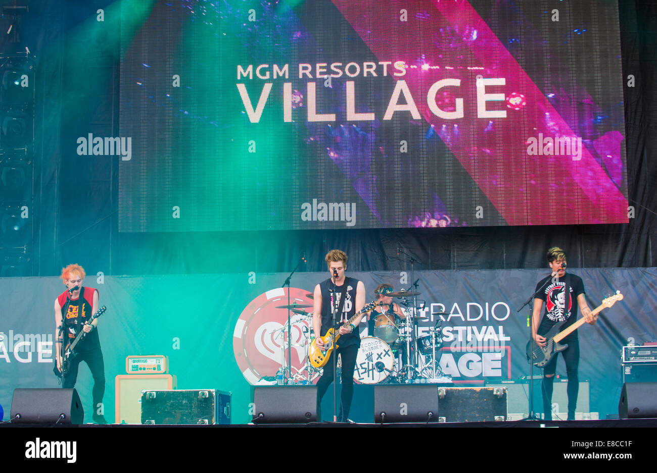 Rock band 5 Seconds of Summer performs on stage at the 2014 iHeartRadio ...