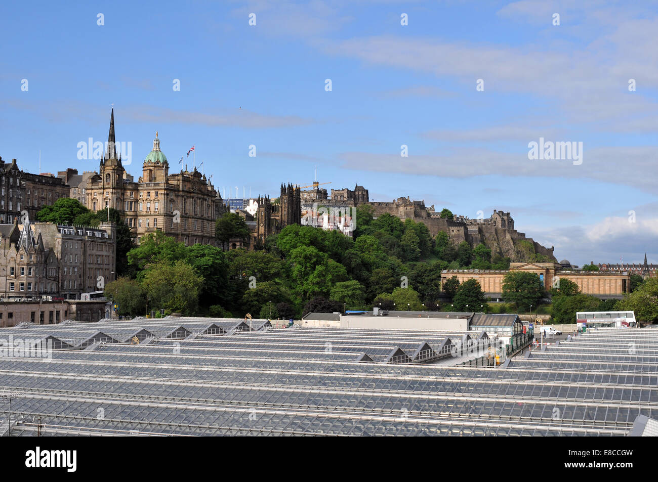 Edinburgh Waverley rail station with the Castle and Old Town beyond ...