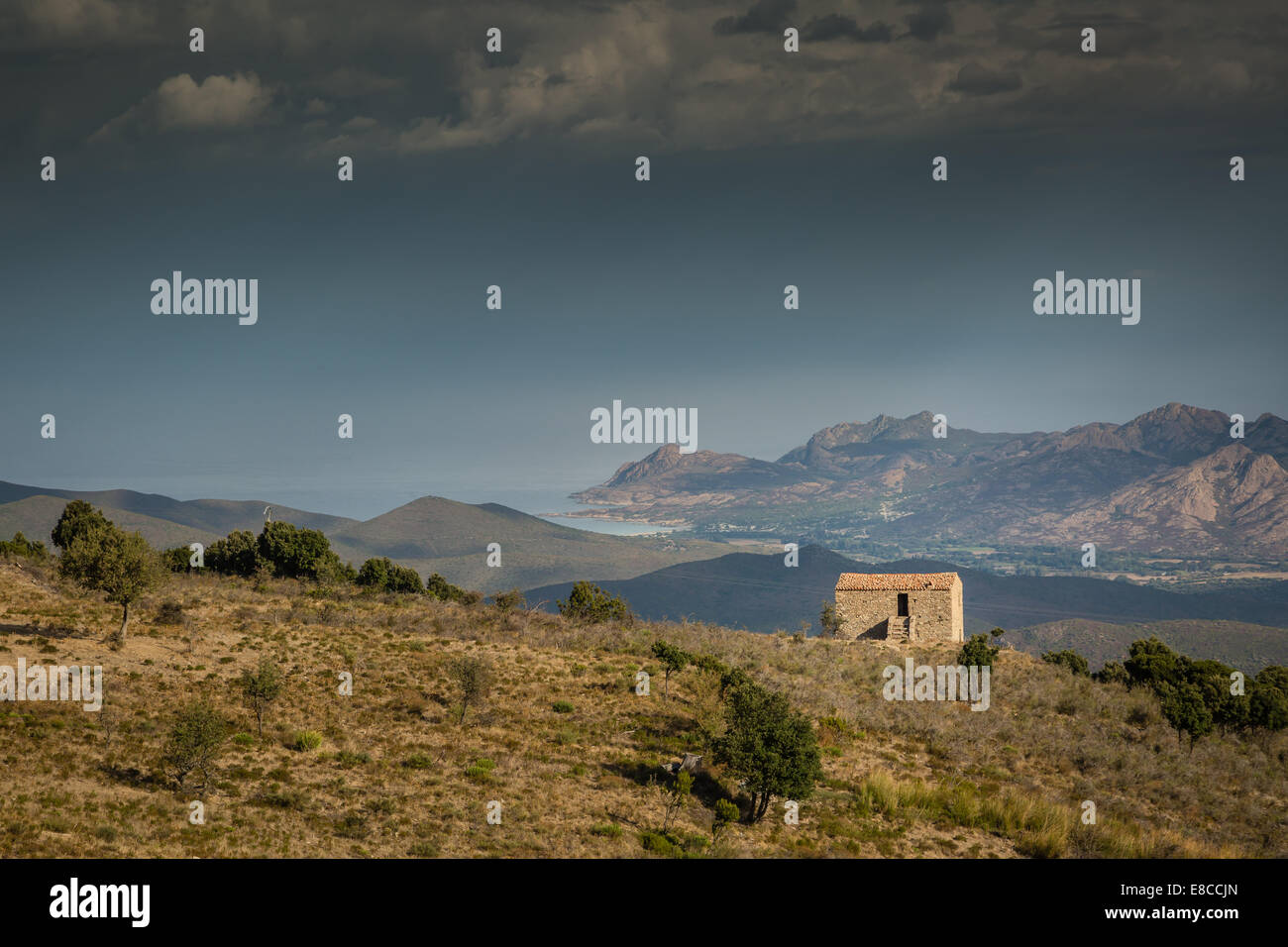 Farmhouse in the hills overlooking the Desert des Agriates in the ...