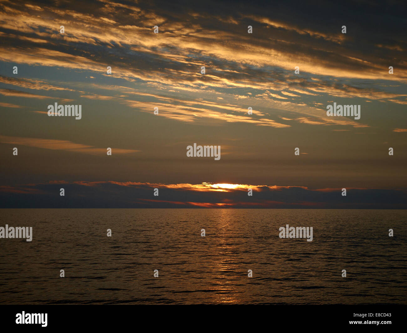 Dramatic sunset over beach ocean hi-res stock photography and images ...