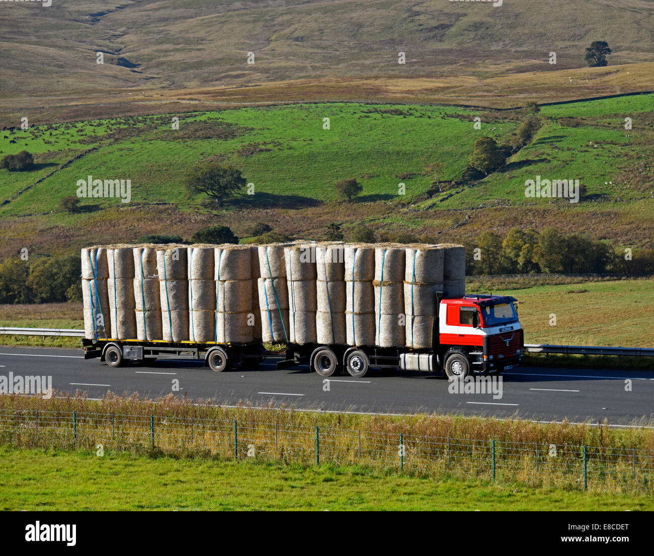 HGV and trailer with load of straw bales. M6 Motorway, northbound. Shap ...