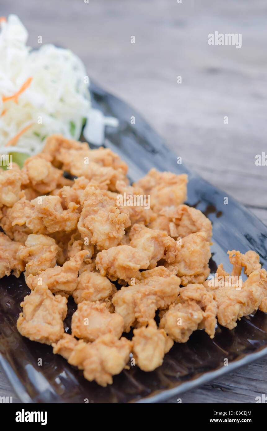 deep fried chicken tendons with fresh vegetable and chili sauce, asian ...