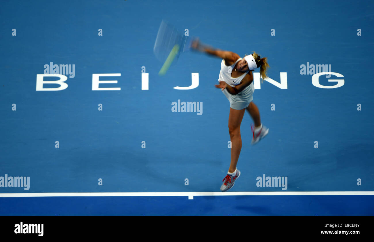 Beijing, China. 5th Oct, 2014. Maria Sharapova of Russia serves the ...