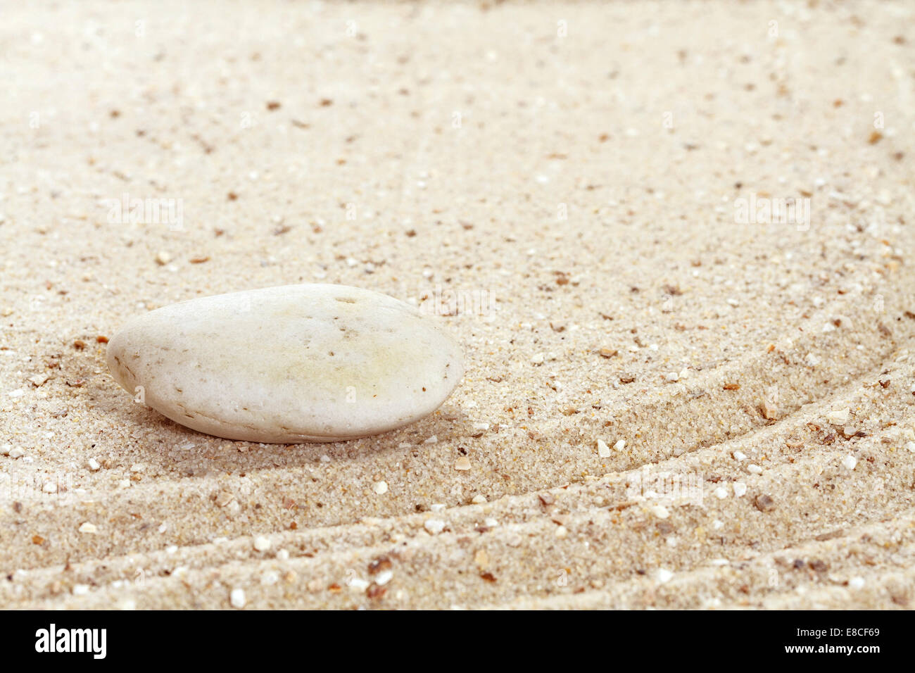 Stack of stones on sand beach Stock Photo - Alamy