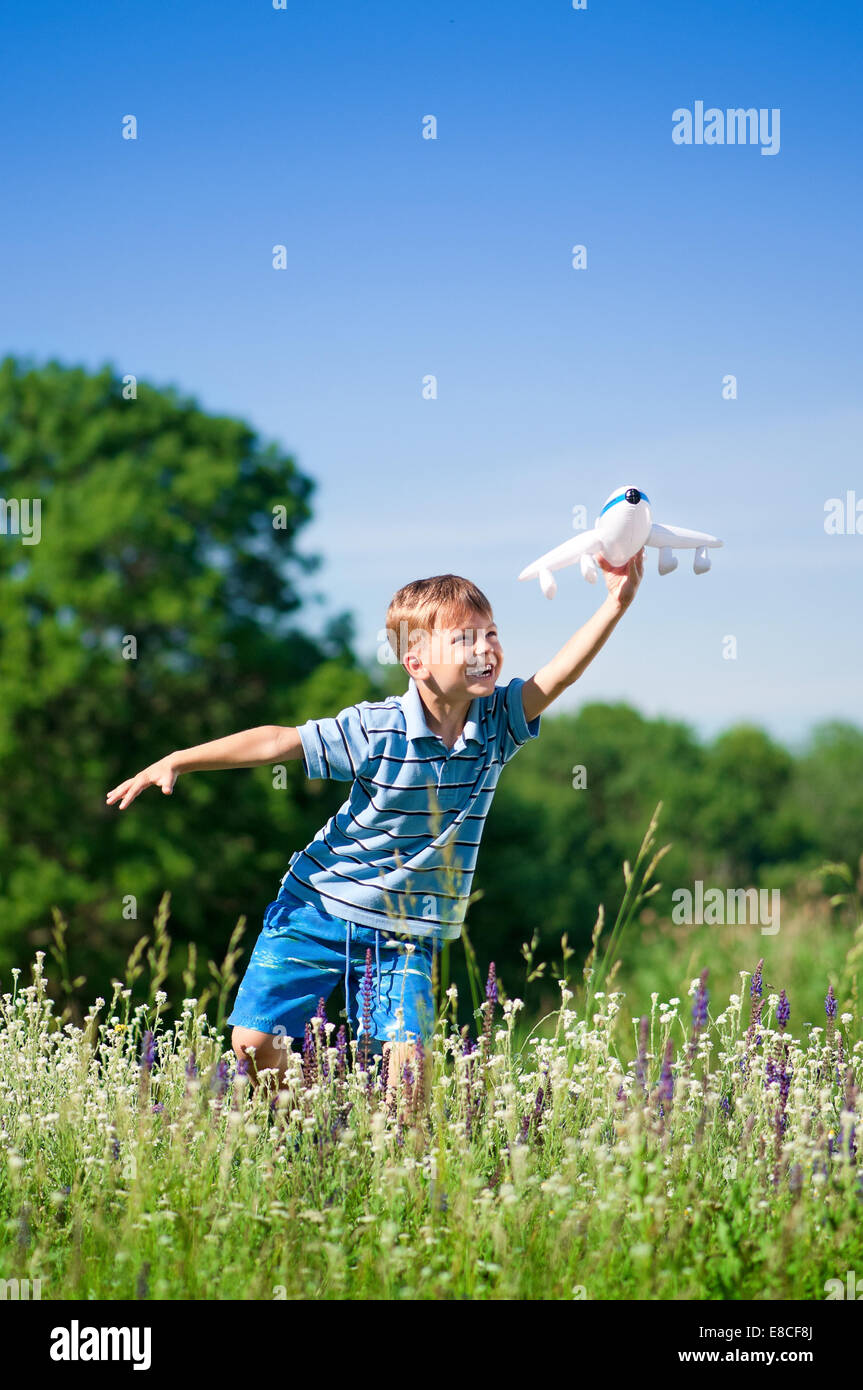 Little boy on meadow Stock Photo - Alamy