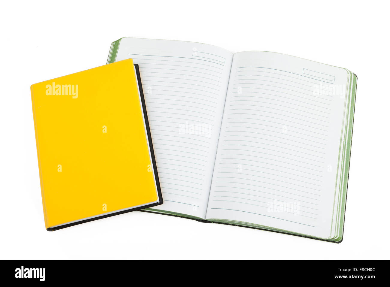 yellow notebook isolated on white Stock Photo - Alamy