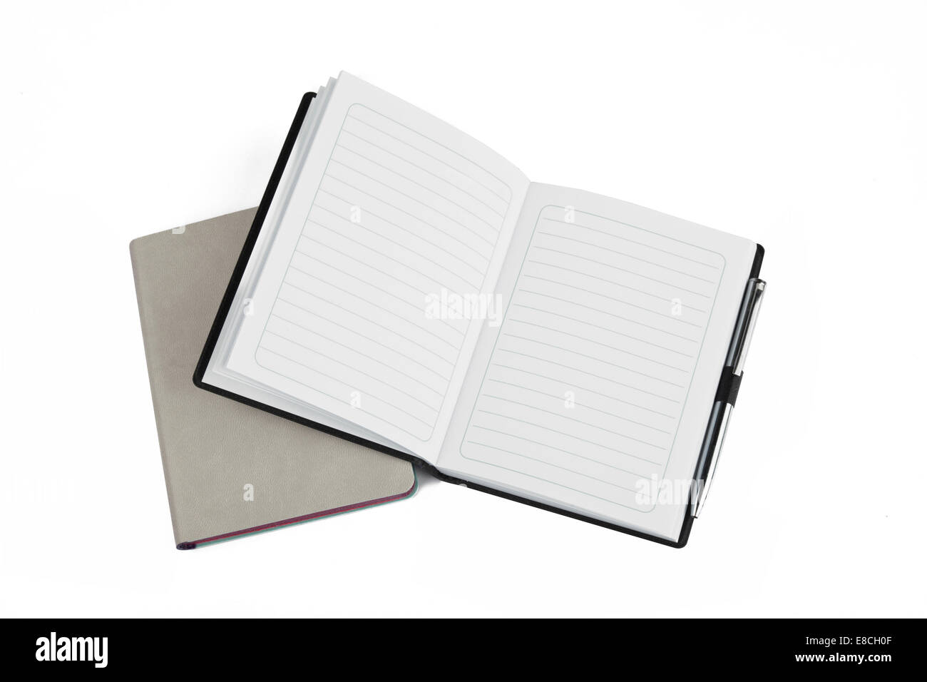 Grey notebook isolated on white Stock Photo - Alamy
