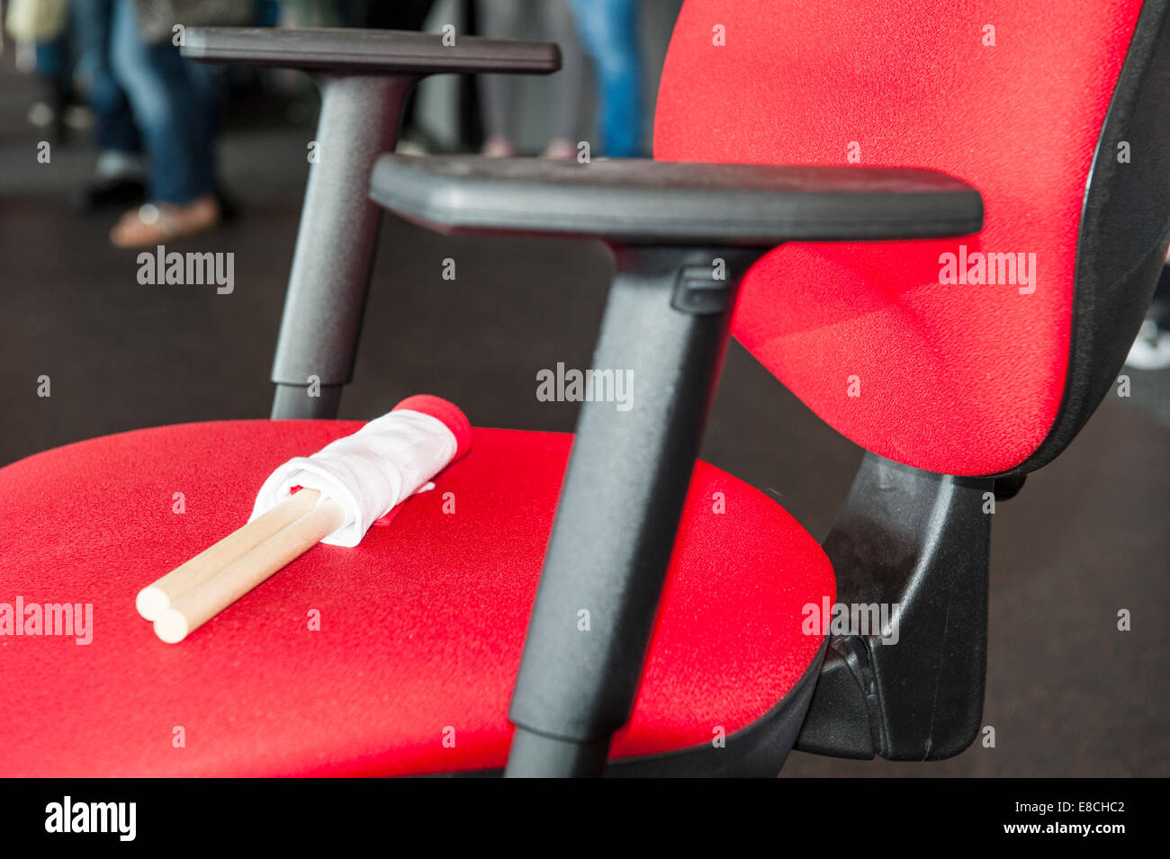 Red arbiter chair with red and white referee flags Stock Photo - Alamy