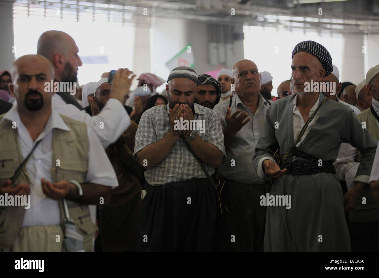 Mina, Mecca, Saudi Arabia. 5th Oct, 2014. Muslim pilgrims arrive to ...