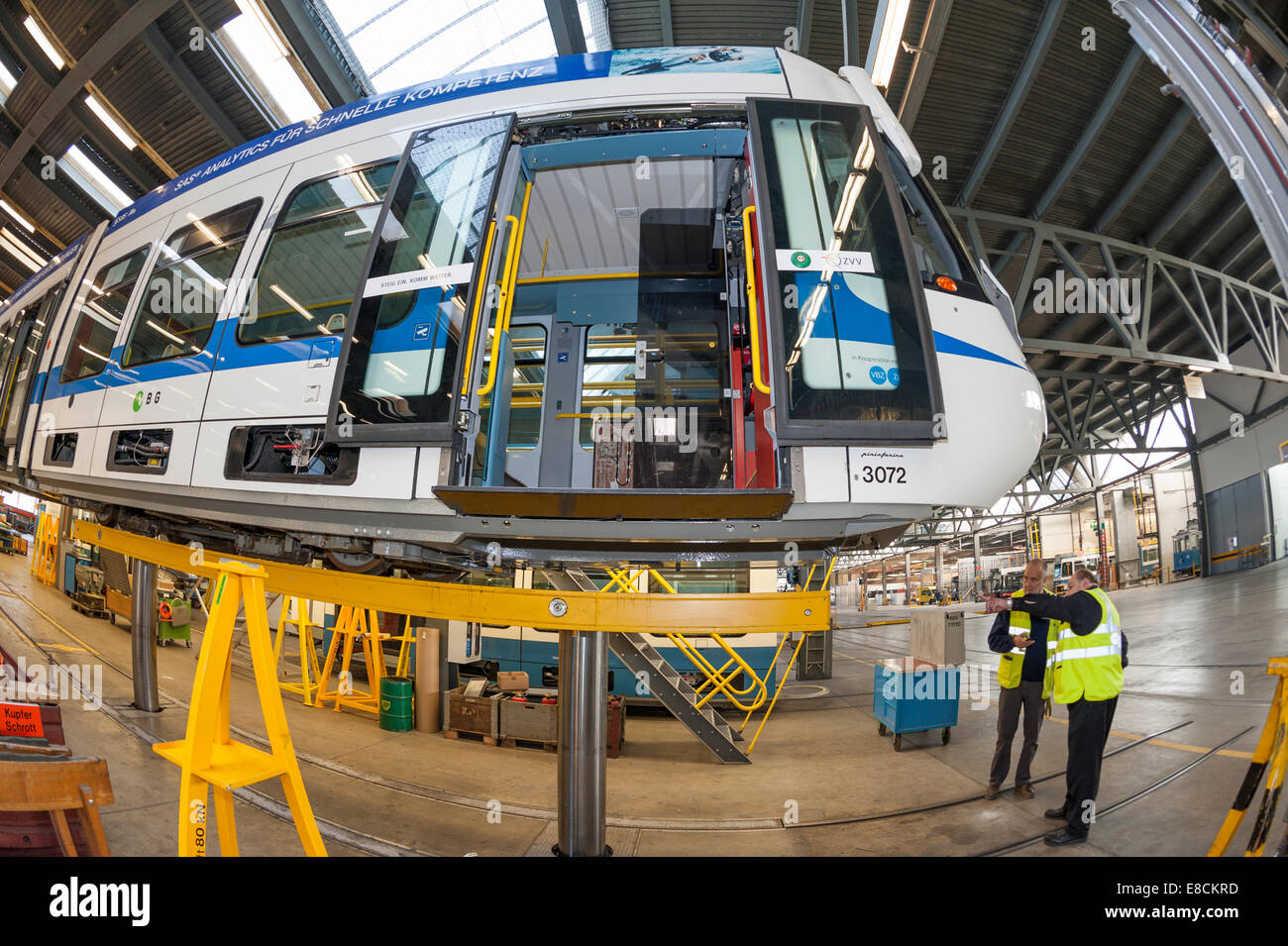 A Zurich Cobra tramway train lifted up on a giant lifting ramp during ...
