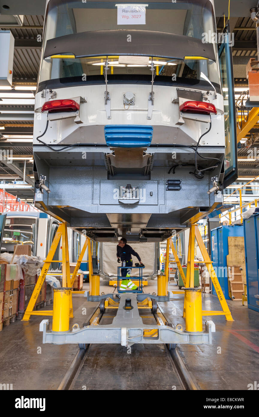 A Zurich tramway train lifted up on a giant lifting ramp during routine ...