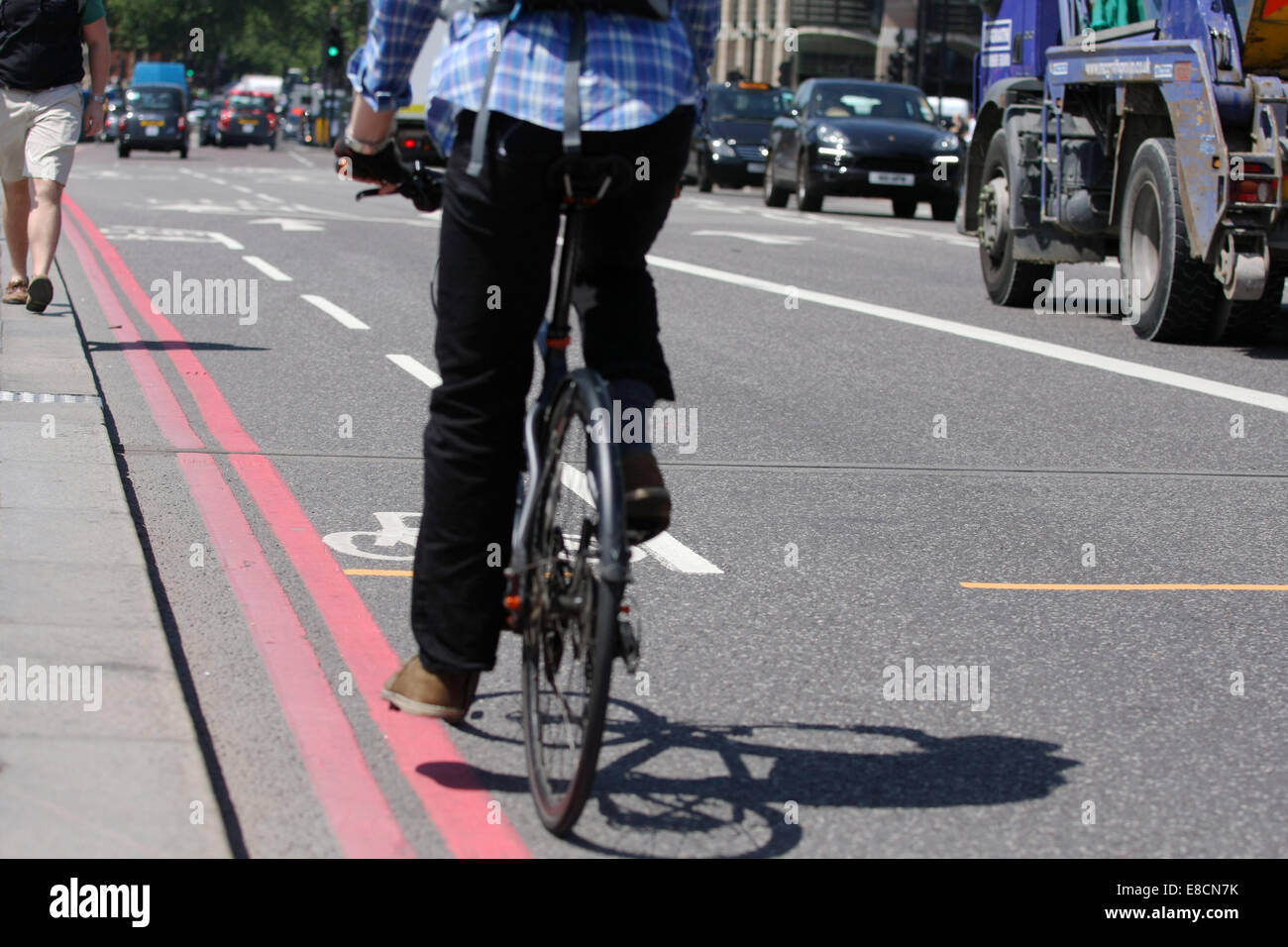 A cyclist approaching a cycle lane in a bus lane in London, England ...