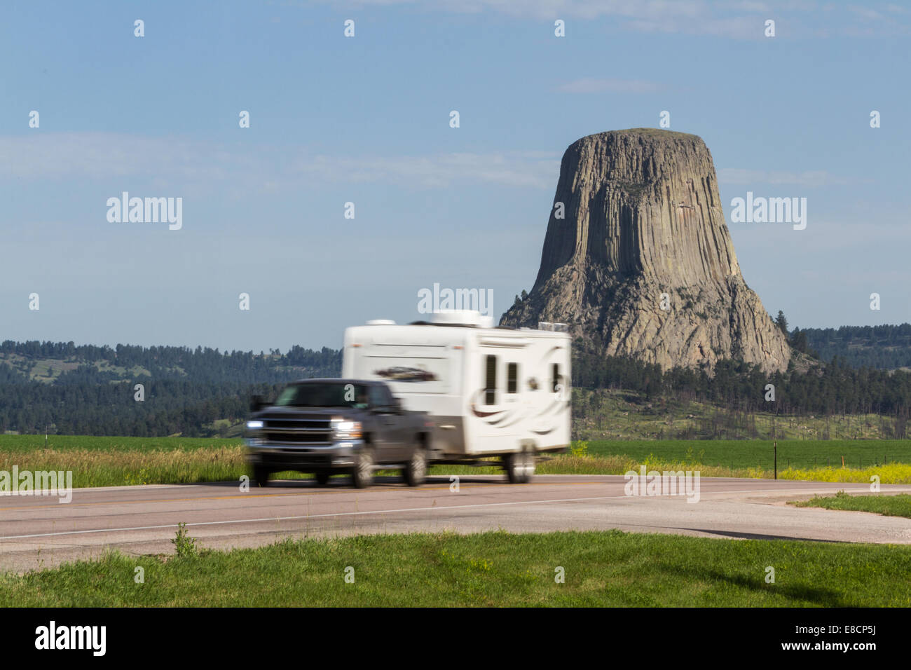 Roadside view of Devils Tower National Monument with a slow shutter ...