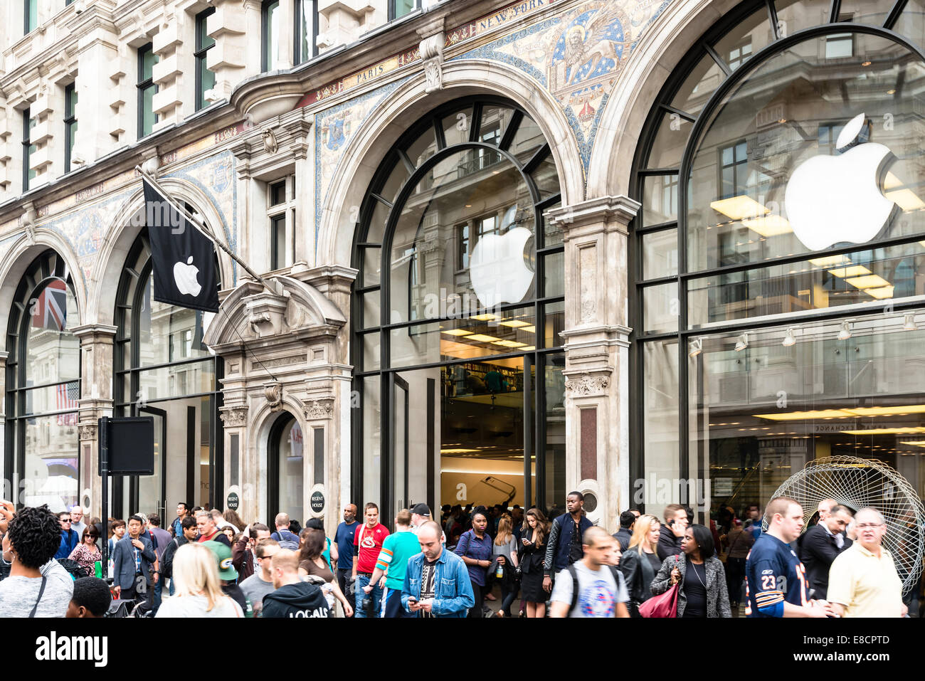 LONDON, UK - SEPTEMBER 27, 2014: Customers are populating the Apple Inc ...