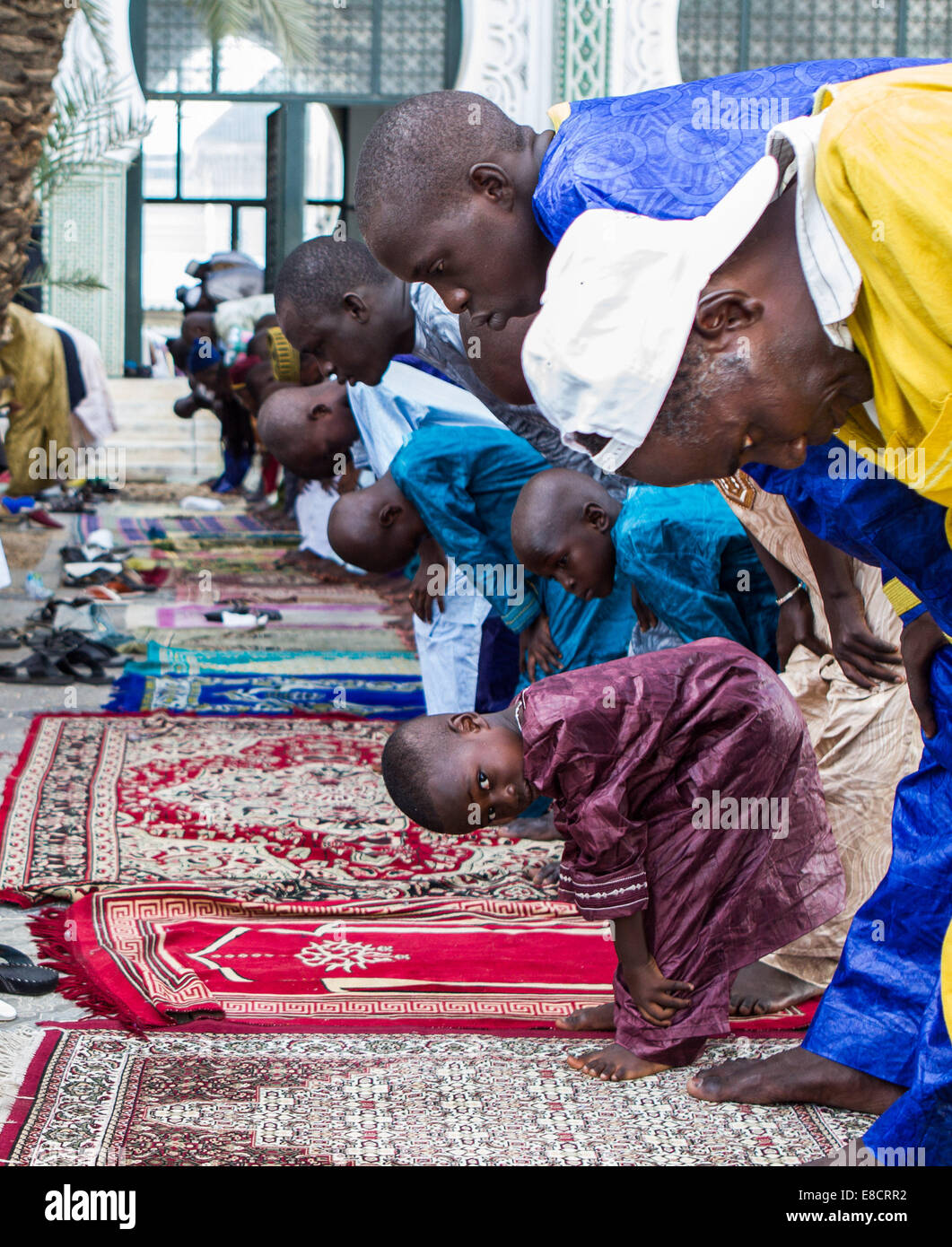 Dakar, Senegal. 5th Oct, 2014. Senegalese men pray during the Eid al ...