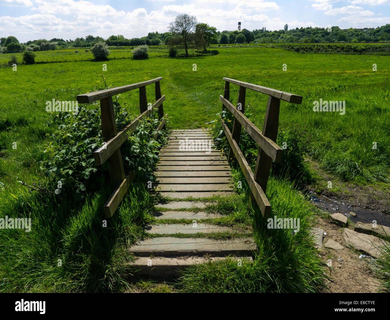 Footbridge across stream in hi-res stock photography and images - Alamy