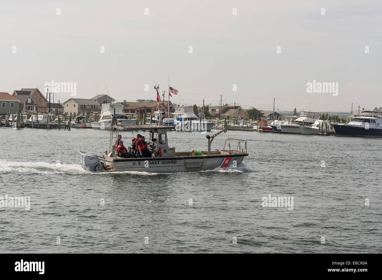 United States Coast Guard on the waterways patroling in Galilee Point ...