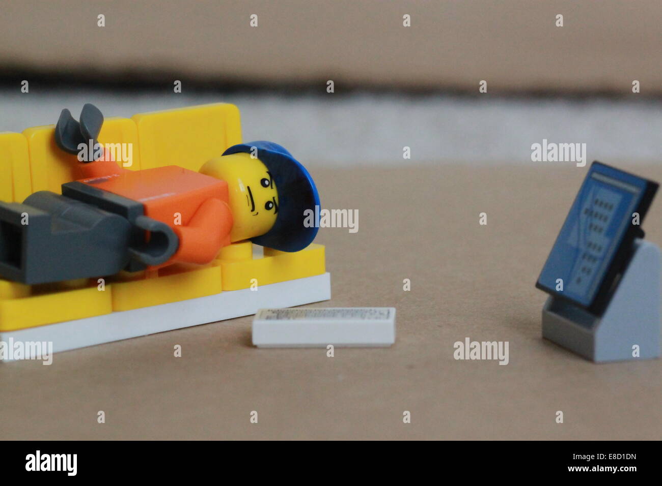 Lego Man Watching Television Stock Photo - Alamy