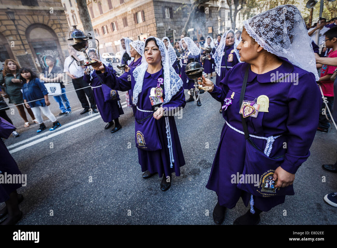 Peruvian women, known as "Sahumadoras", burn incense while ...