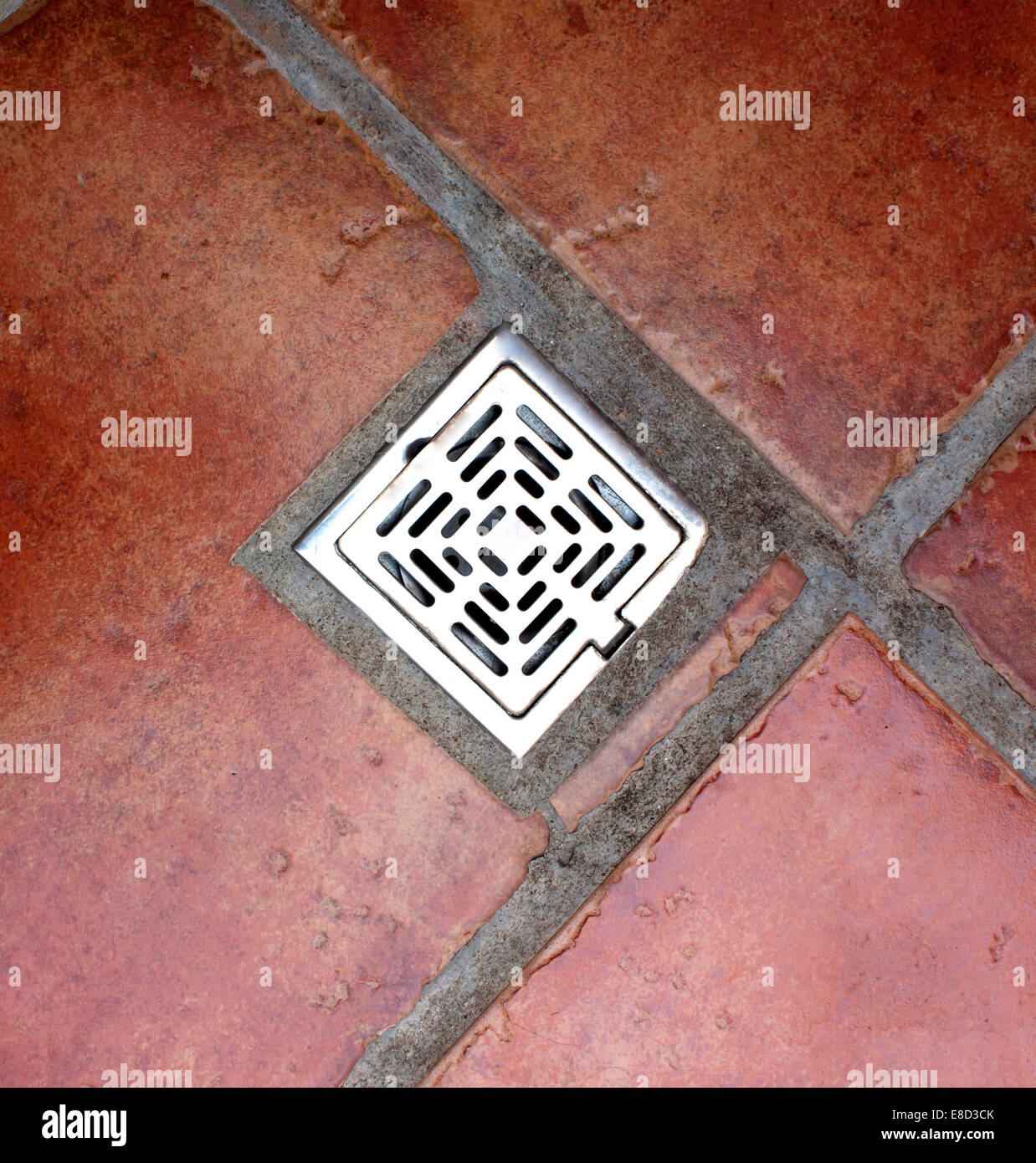 drain. Water flows through a metal drain hole cover buried in the ... drain. Water flows through a metal drain hole cover buried in the ...