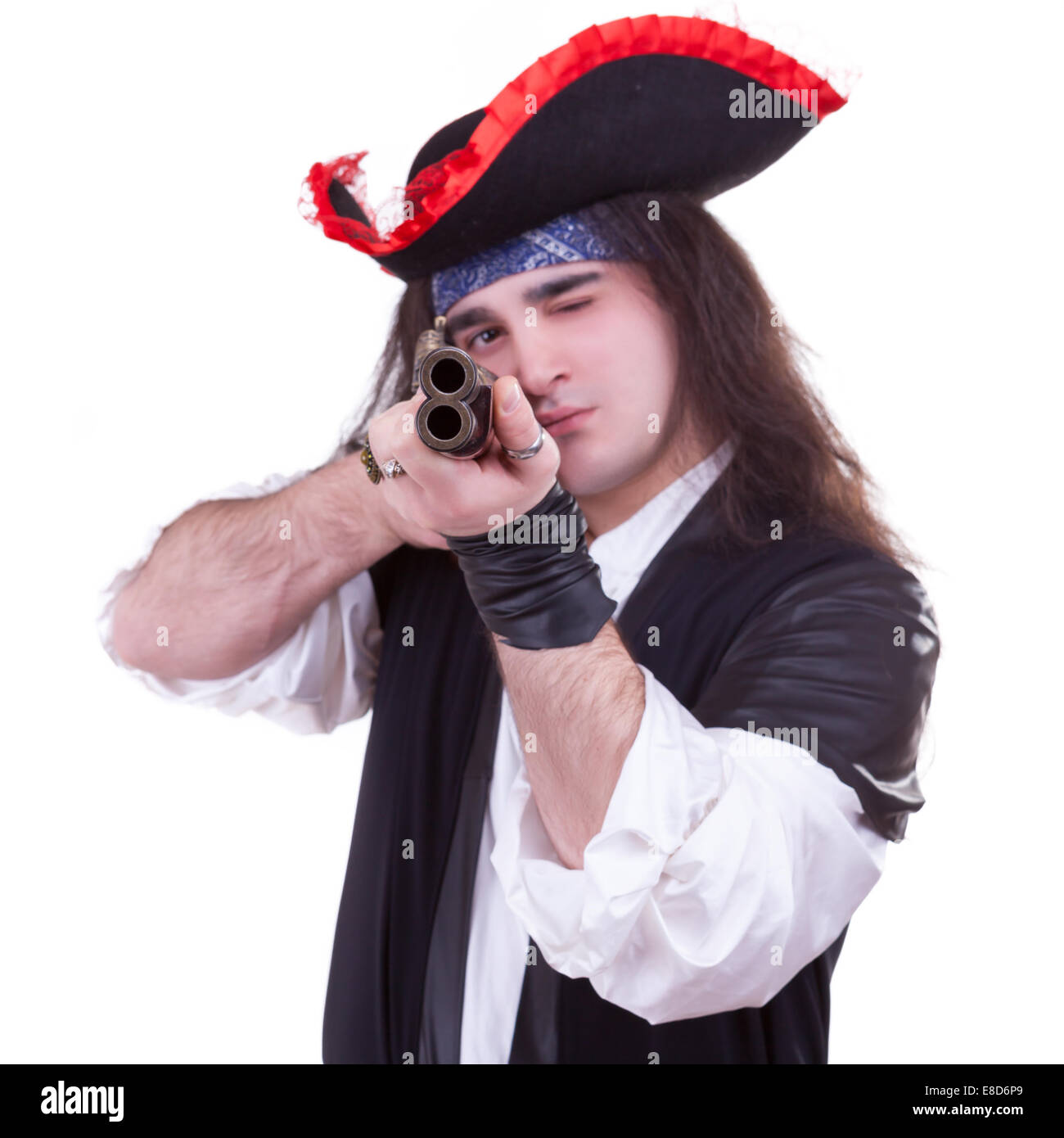 Scary pirate with a gun in hands isolated on white background Stock ...