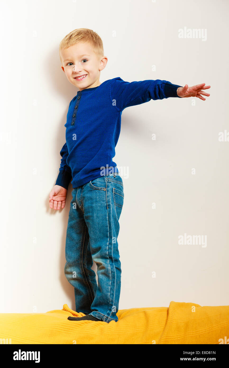 Happy childhood. Full length funny boy child kid preschooler standing ...