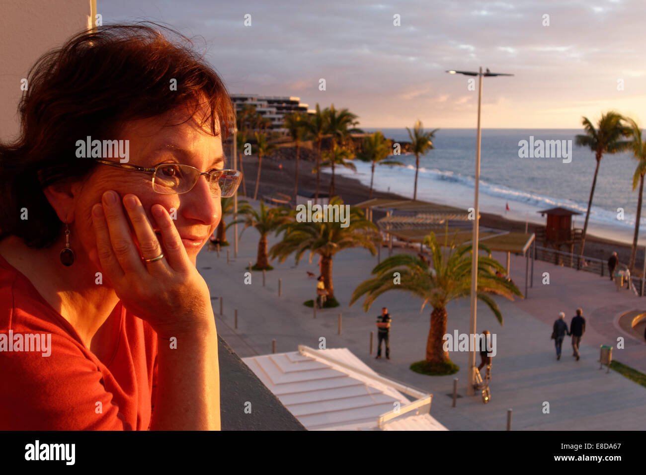 People looking from their balcony hi-res stock photography and images ...
