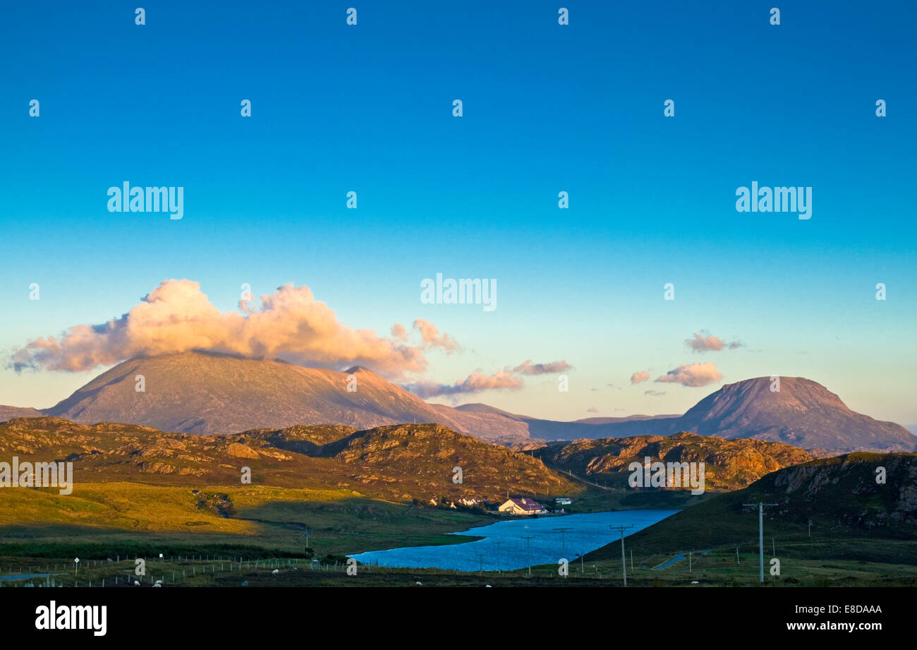 Foinaven (with cloud above the summit) and Arkle, viewed from moorland ...