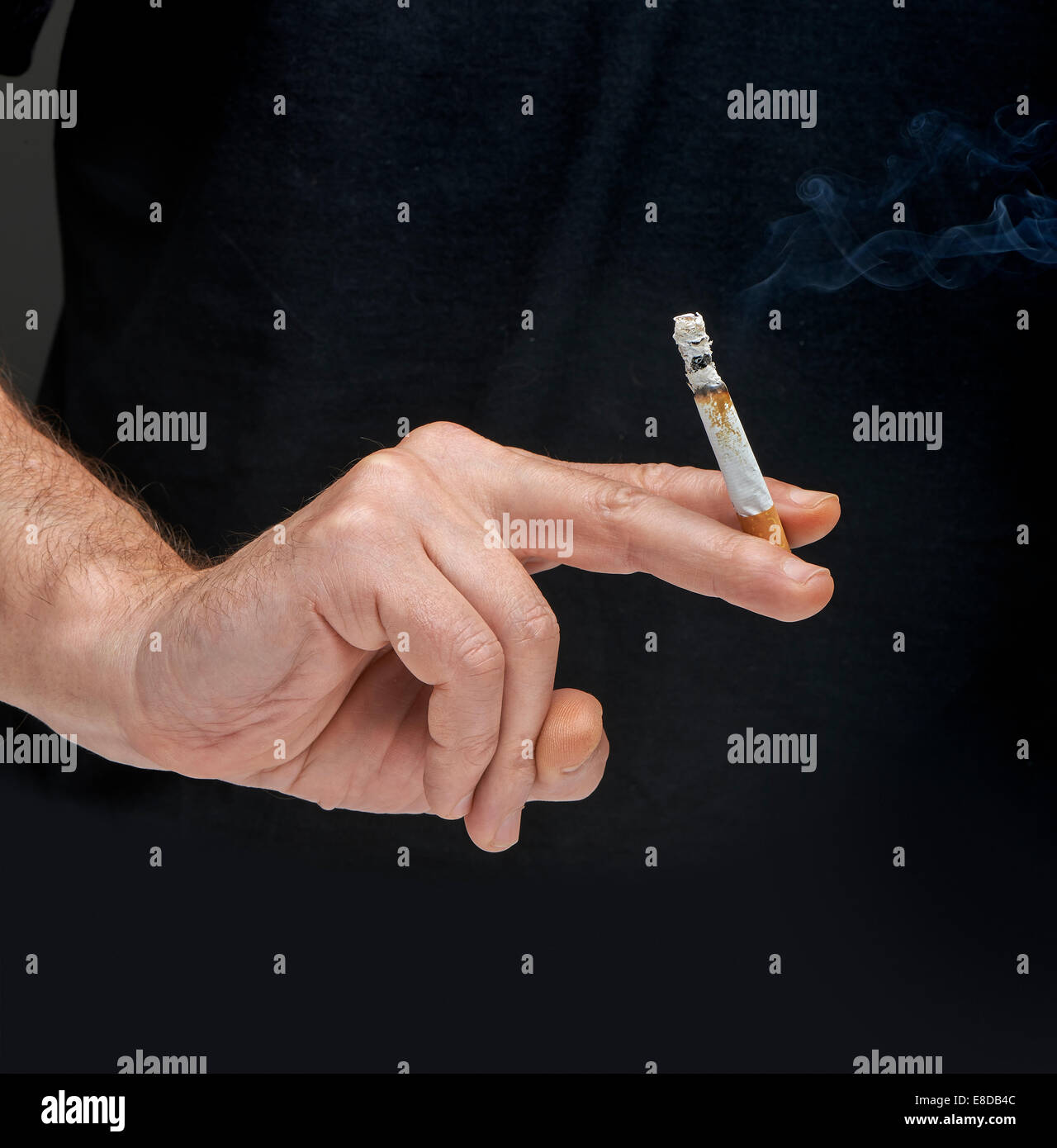 Hand and cigarette hi-res stock photography and images - Alamy