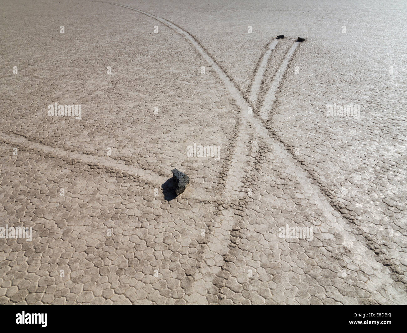 Tracks created by the mysterious moving rocks at the "Racetrack", a dry ...