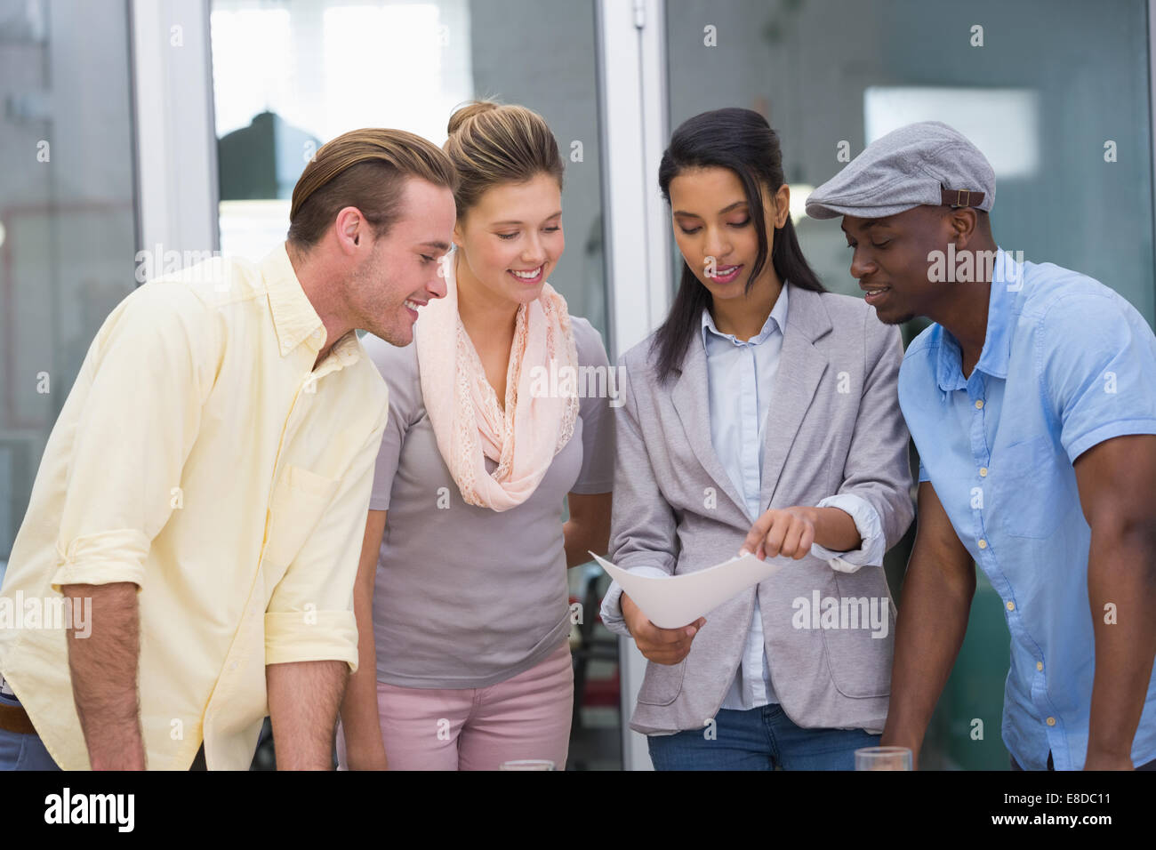 Colleagues in discussion at office Stock Photo - Alamy