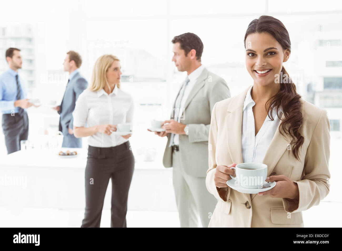Work team during break time in office Stock Photo - Alamy