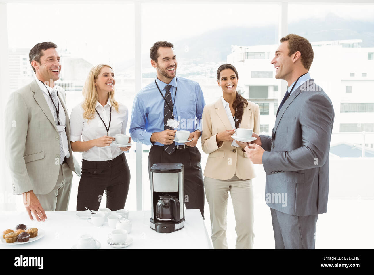 Happy work team during break time Stock Photo - Alamy