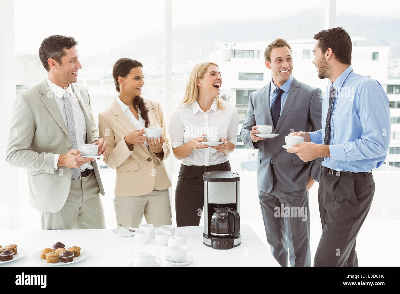 Happy work team during break time Stock Photo - Alamy