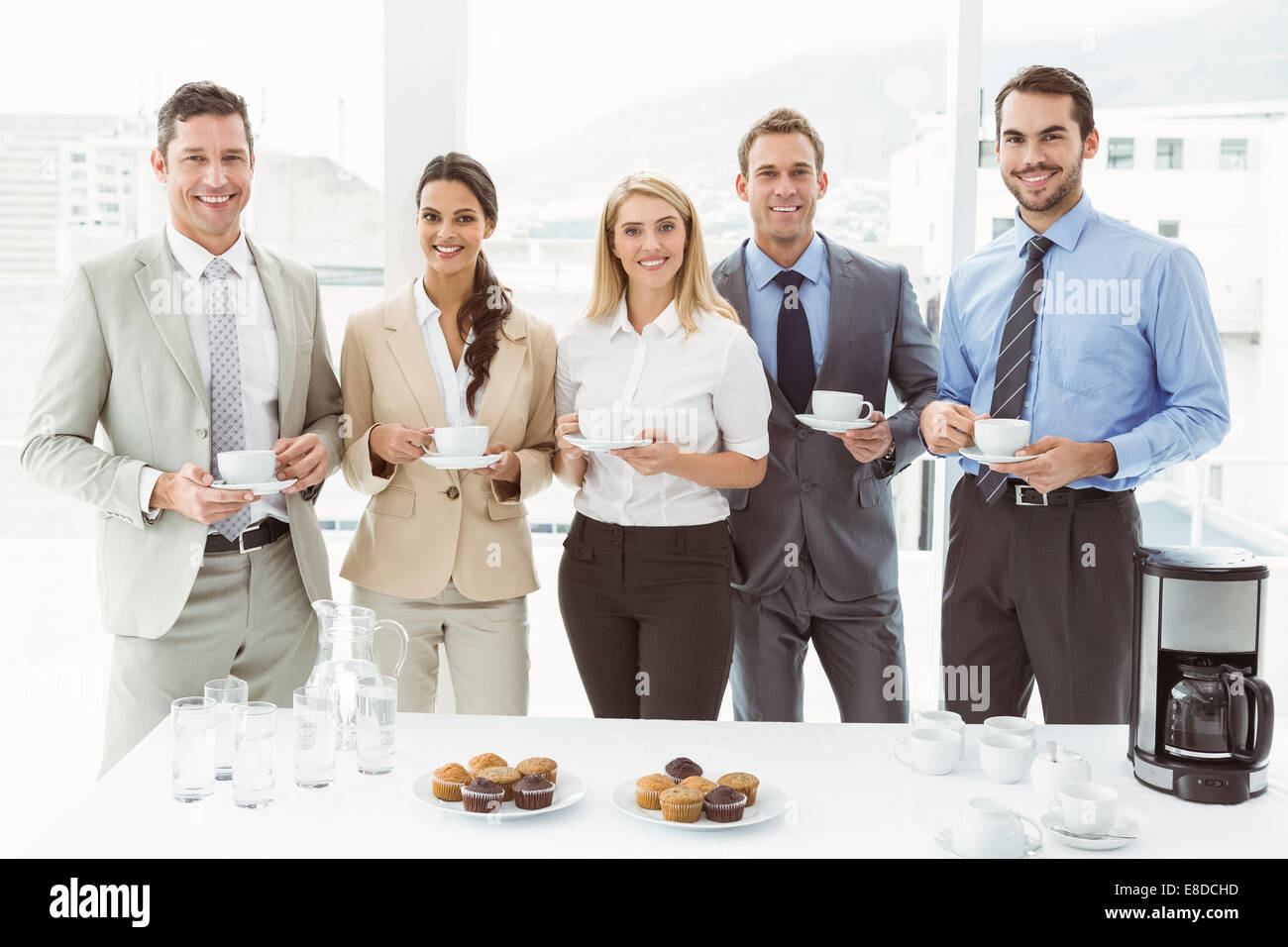 Work team during break time in office Stock Photo - Alamy