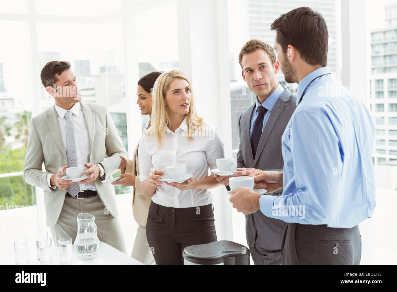 Work team during break time Stock Photo - Alamy