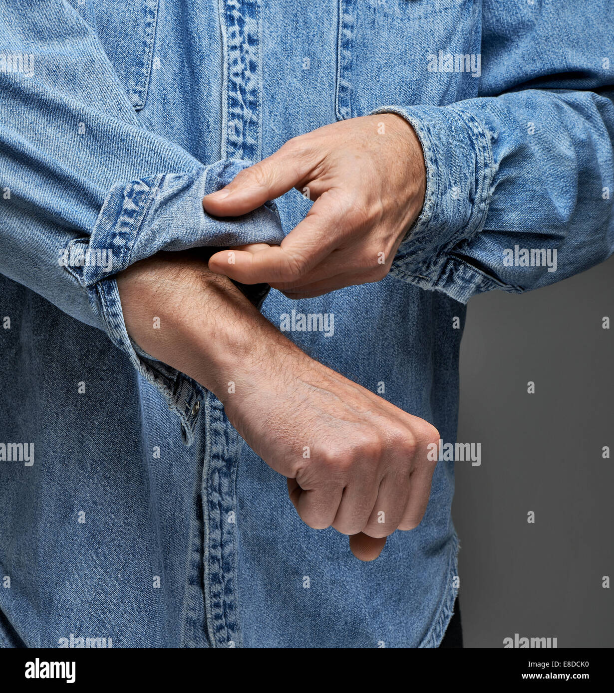 Rolled up sleeves hi-res stock photography and images - Alamy