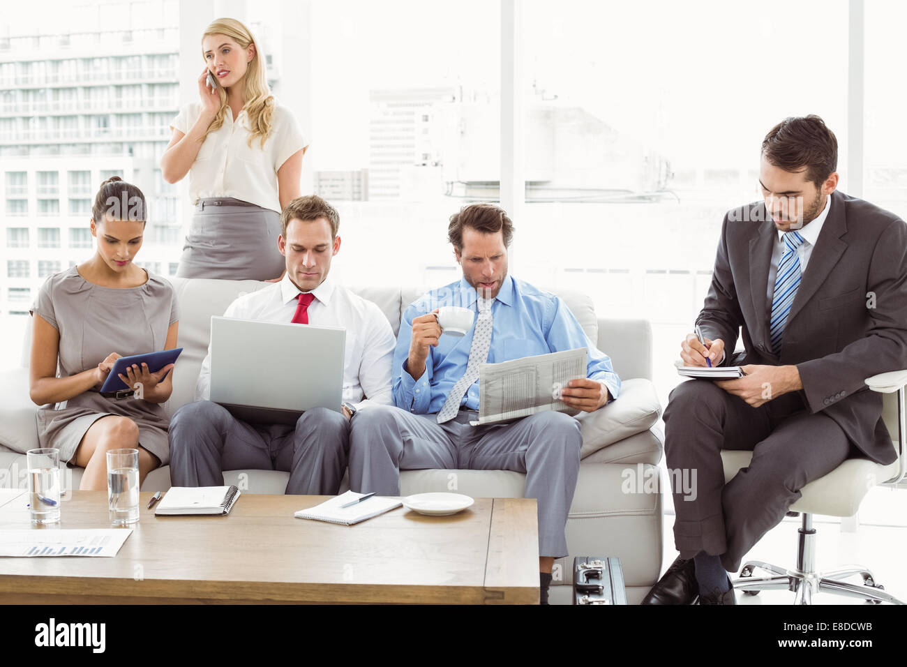 Colleagues at work Stock Photo - Alamy