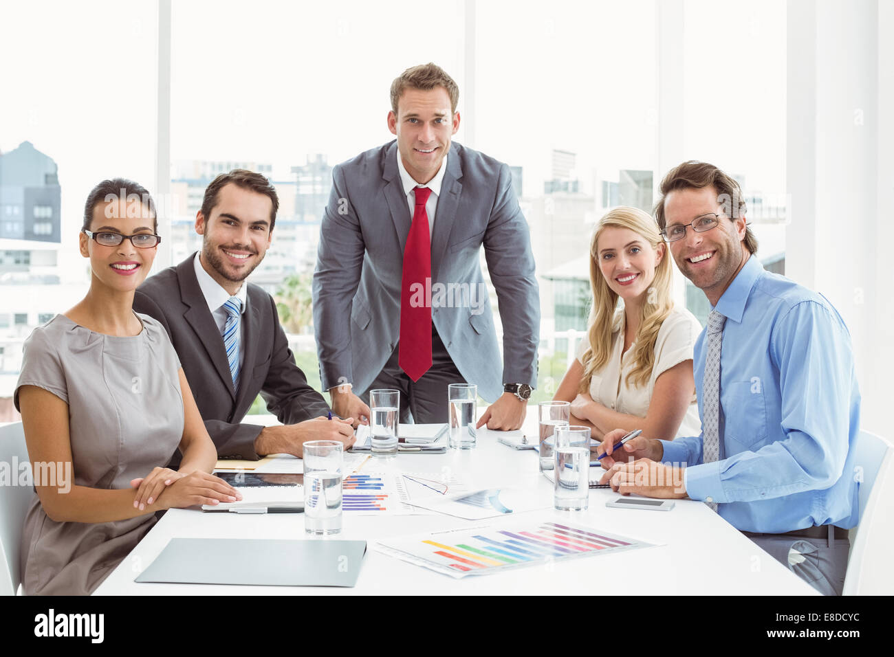 Business colleagues meet standing table hi-res stock photography and ...