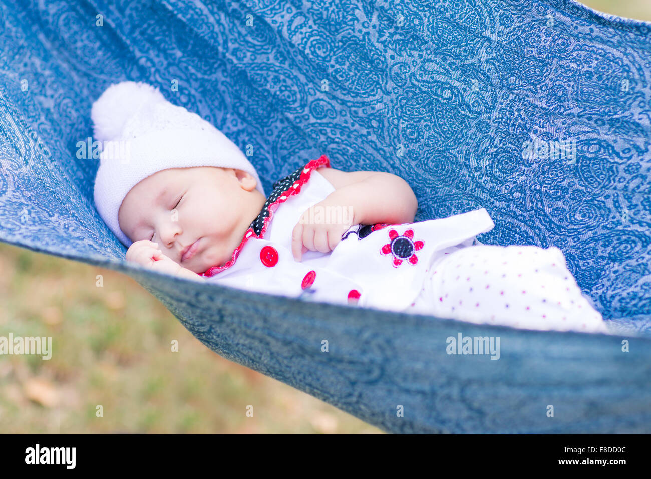 Cute little baby sleeping in the park outdoor on the grass Stock Photo ...