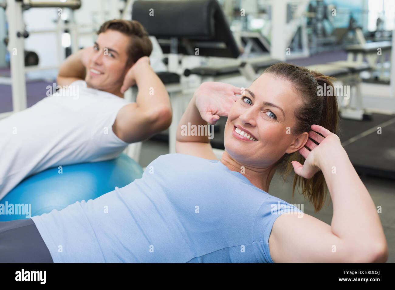 Portrait couple doing physical exercise hi-res stock photography and ...