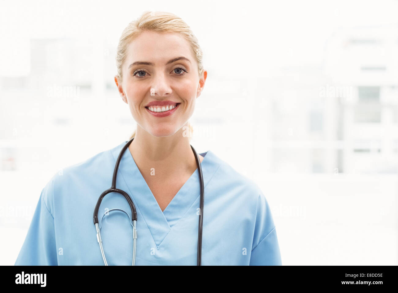 Portrait of a smiling confident female doctor Stock Photo - Alamy