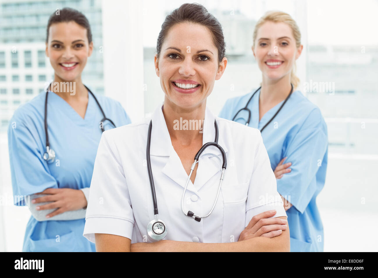 Portrait of confident female doctors with arms crossed Stock Photo - Alamy