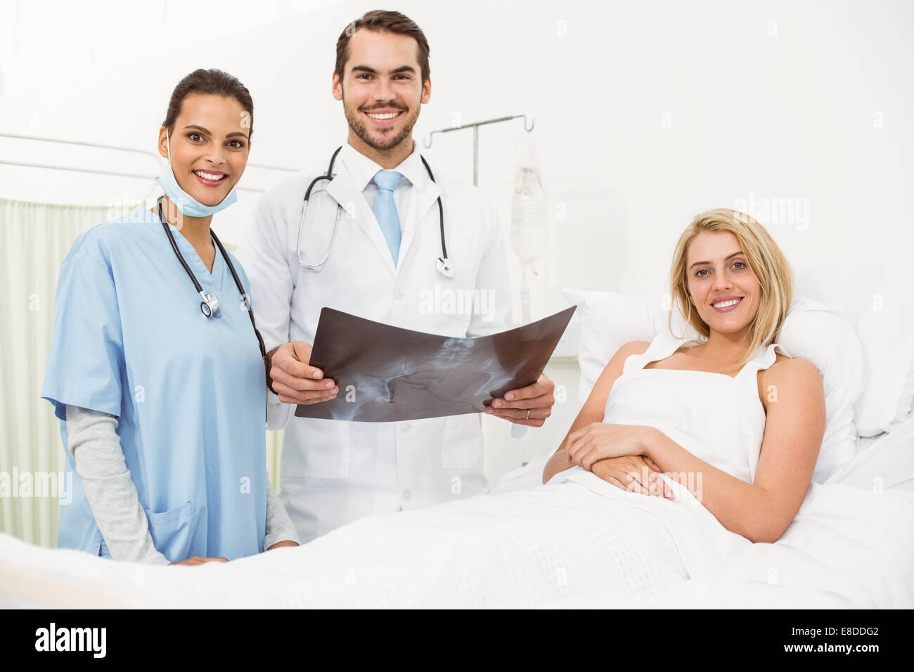 Portrait of doctors and patient with x-ray Stock Photo - Alamy