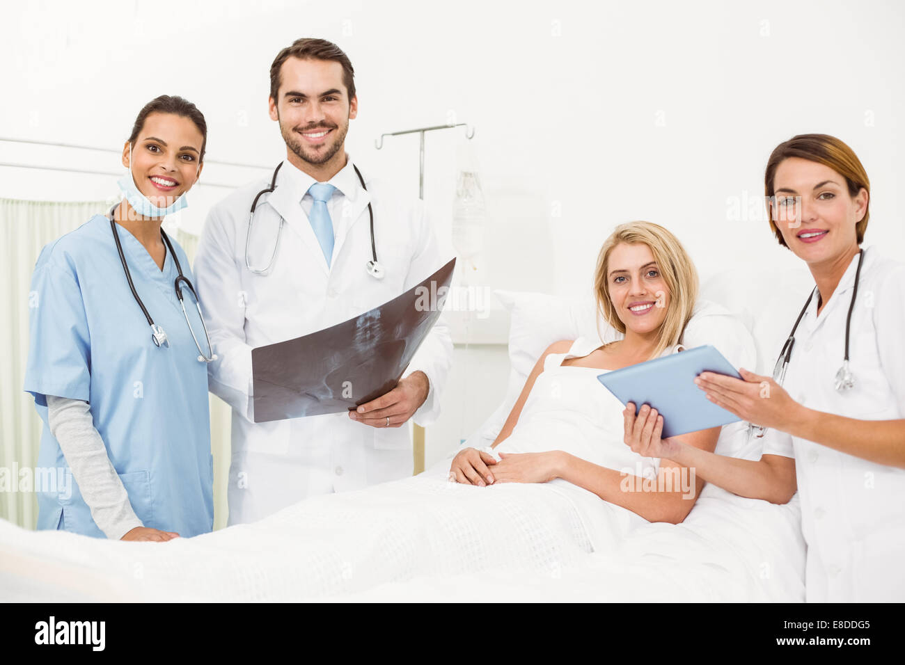 Portrait of doctors and patient with x-ray Stock Photo - Alamy