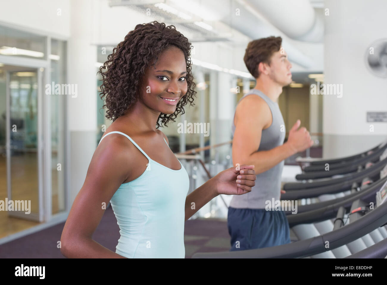 Black woman running on treadmill hi-res stock photography and images ...