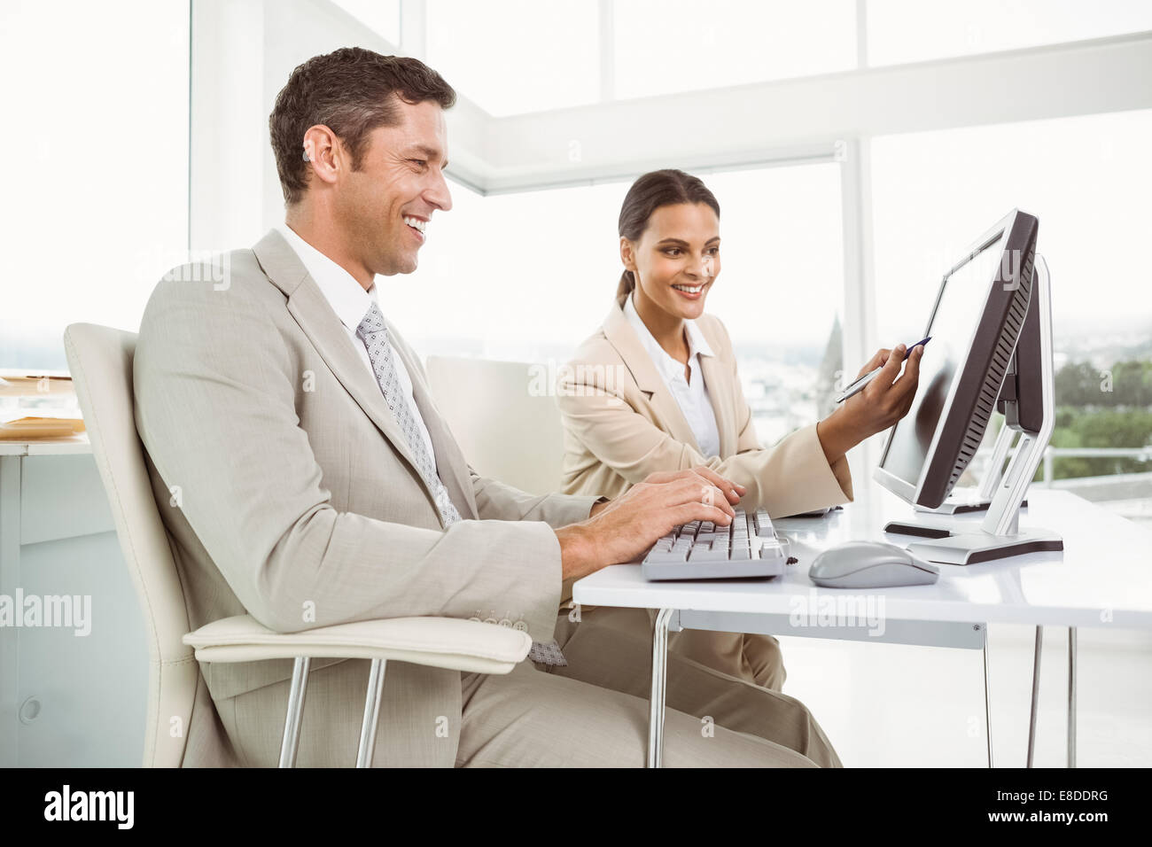 Business people using computer in office Stock Photo - Alamy